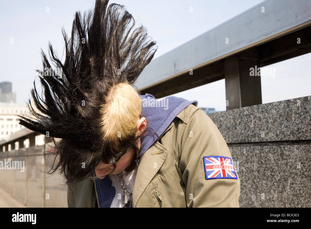 A punk girl 'Rae Ray Riots' with a large Mohican, London Bridge, London ...