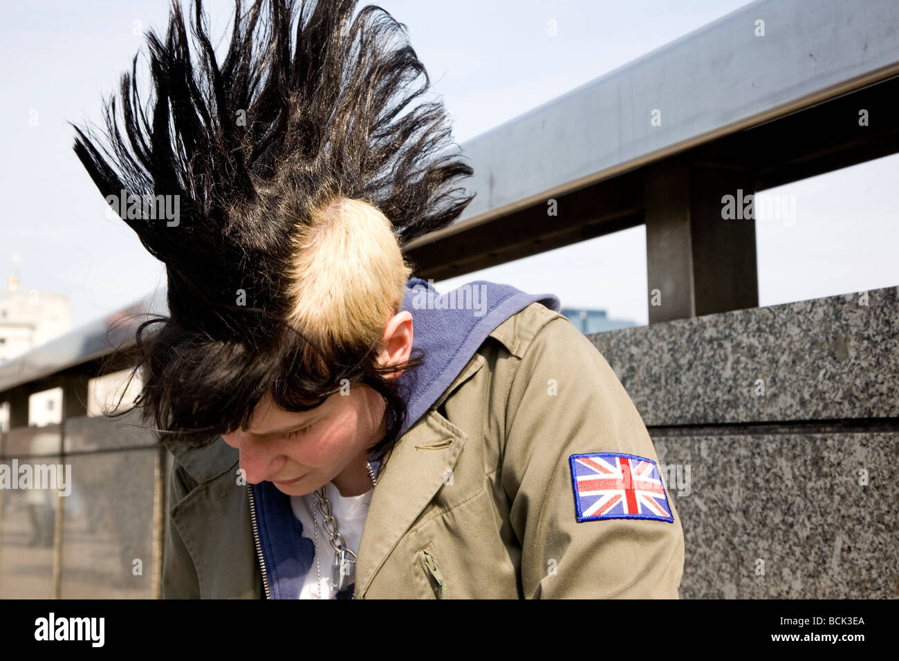 A punk girl 'Rae Ray Riots' with a large Mohican, London Bridge, London ...