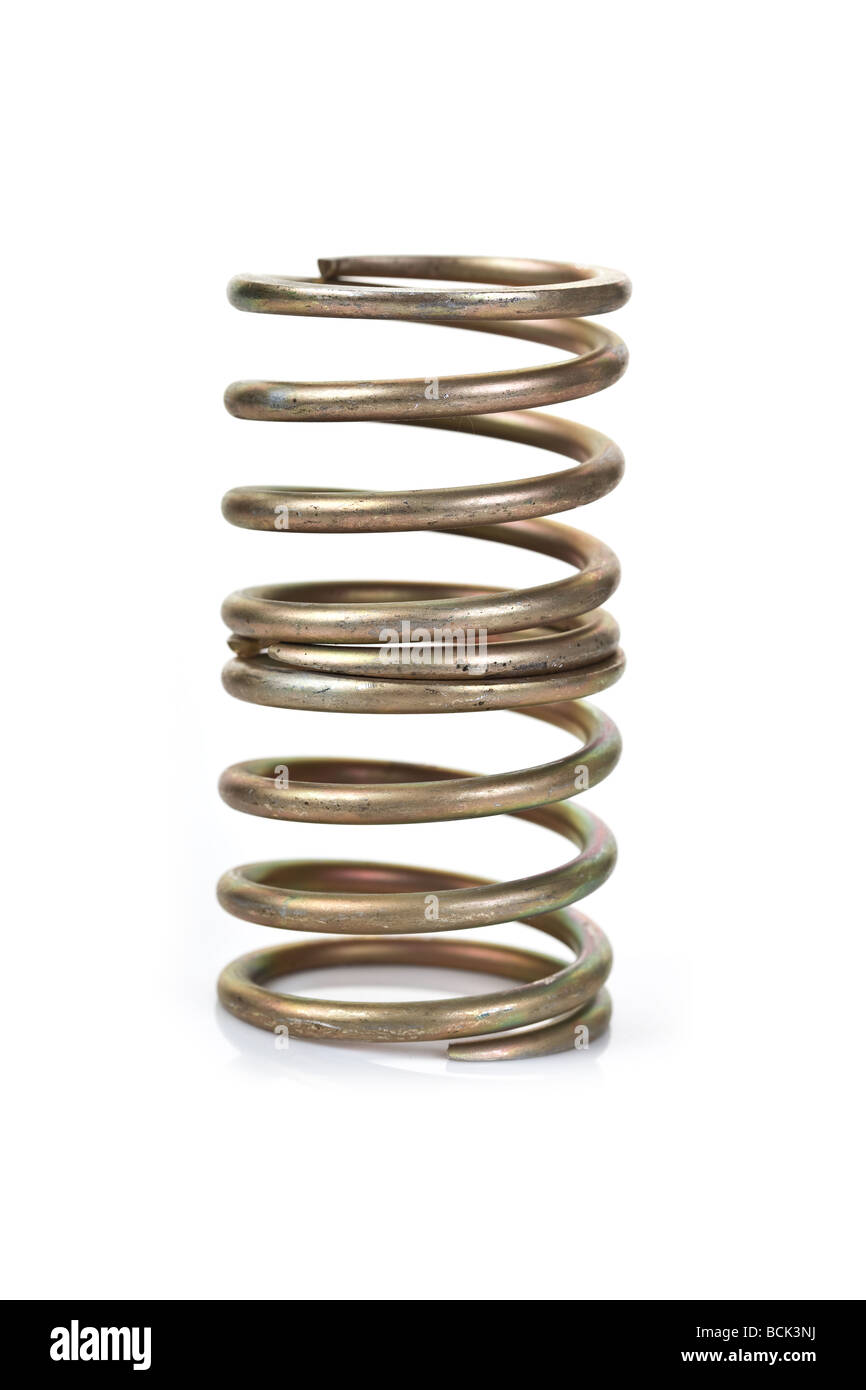 Golden spring isolated on a white background Stock Photo - Alamy