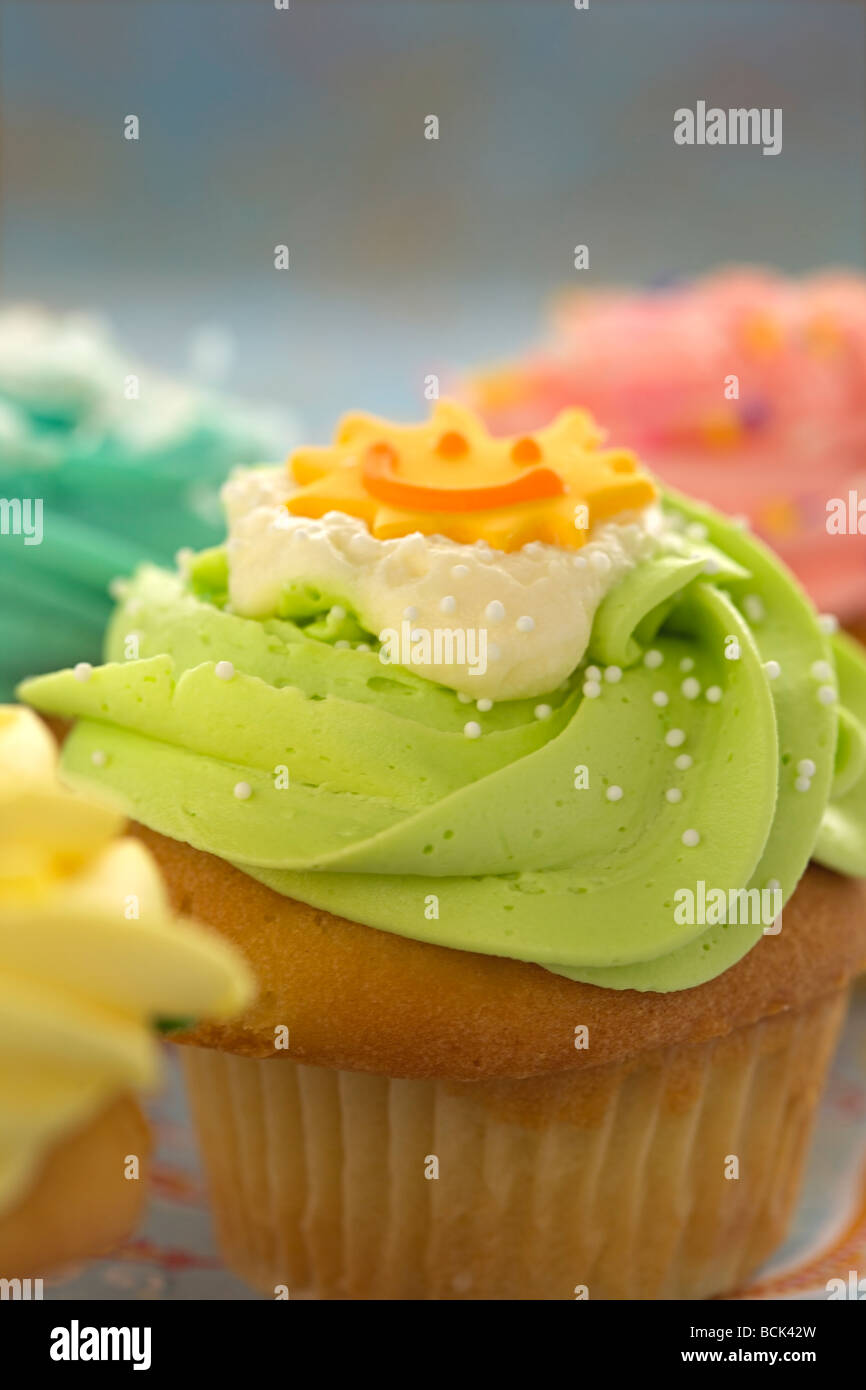 Close-up cupcakes with frosting and sprinkles Stock Photo - Alamy