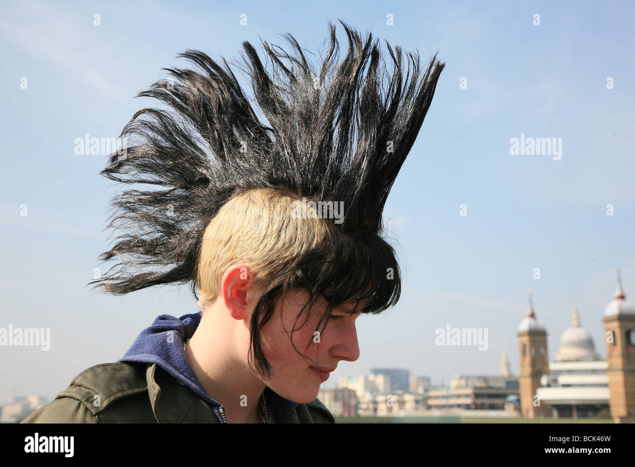 A punk girl 'Rae Ray Riots' with a large Mohican, London Bridge, London ...