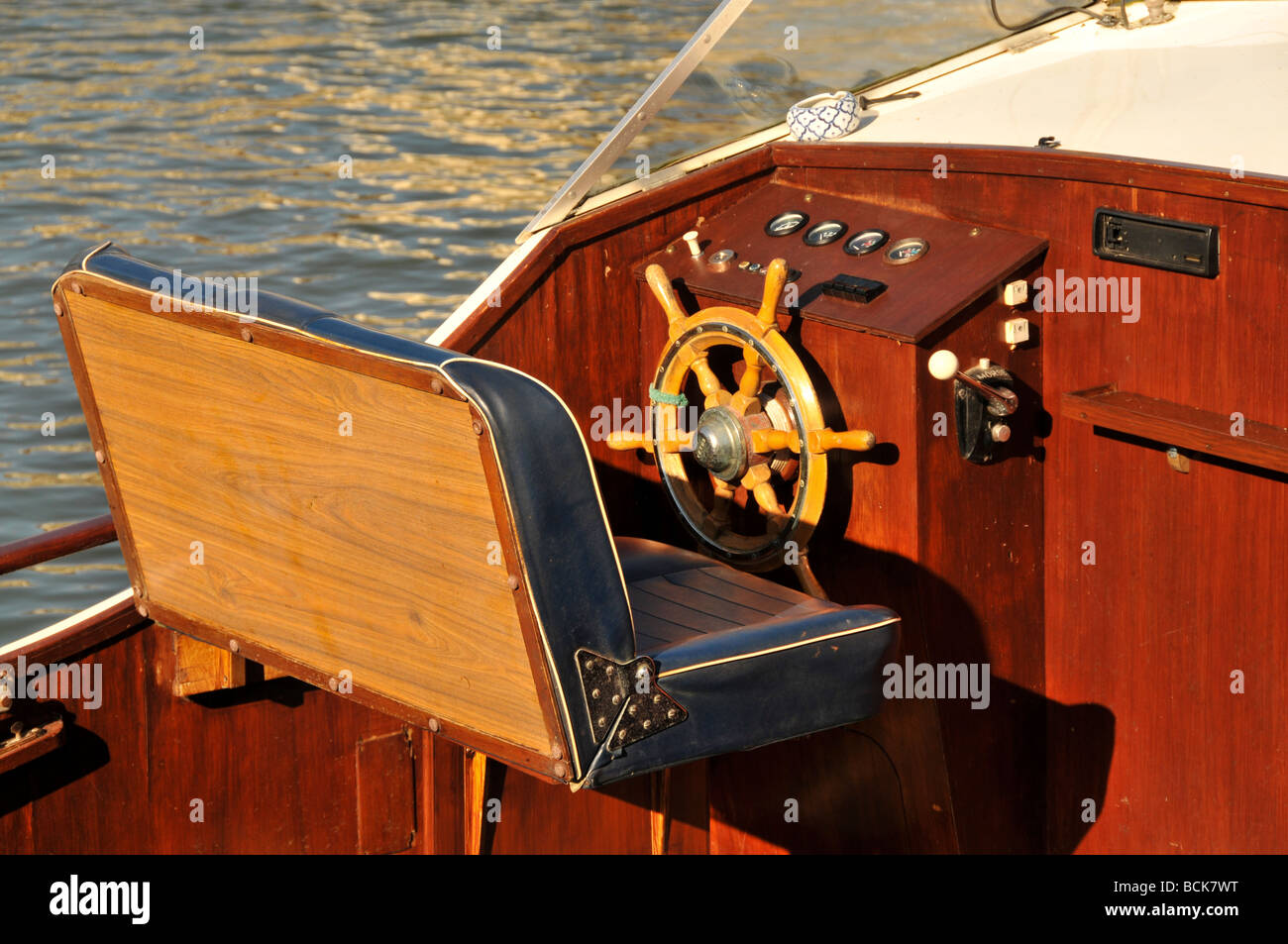 Driver seat on boat Stock Photo - Alamy
