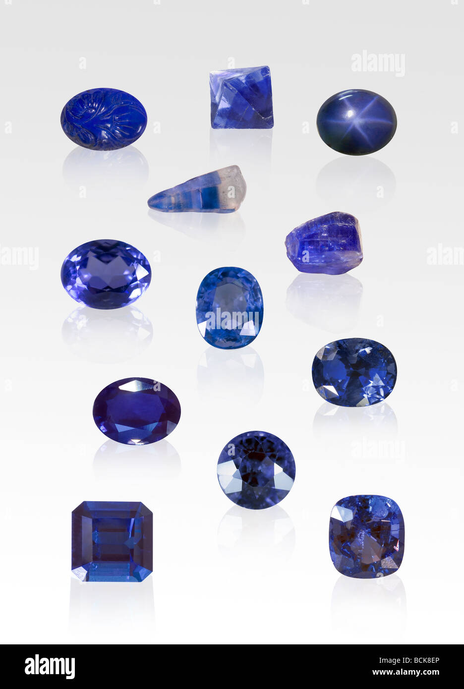 Indigo gemstone and crystal specimens on white background Stock Photo ...