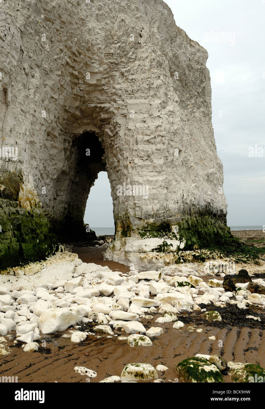 A natural arch in the chalk cliffs at Kingsgate Bay. Kingsgate, Kent ...