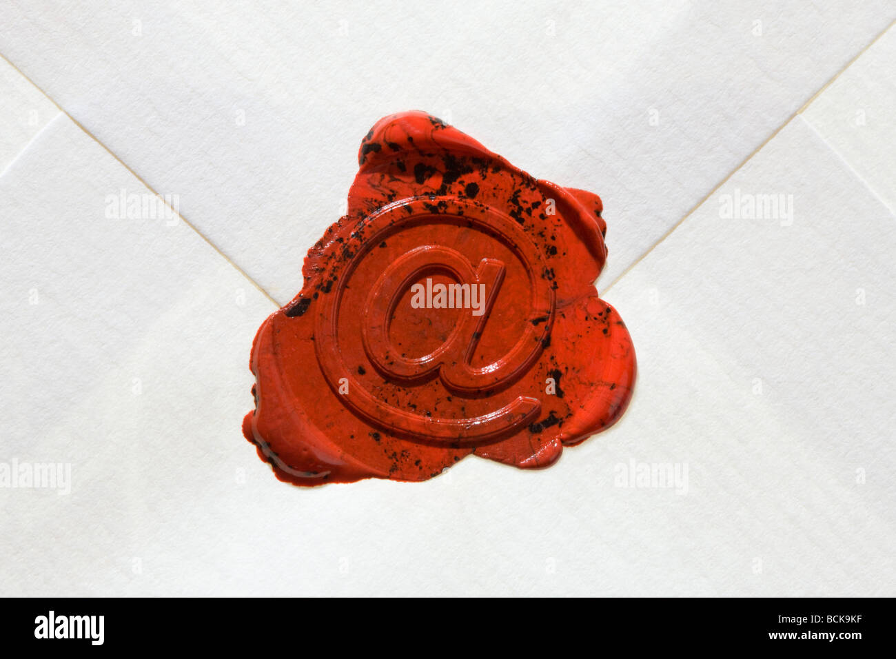 Empty envelope with e-mail-sign as a seal Stock Photo - Alamy