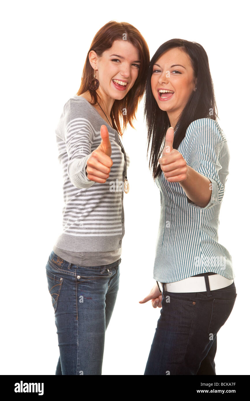 Two young girls handshake and agree Stock Photo - Alamy