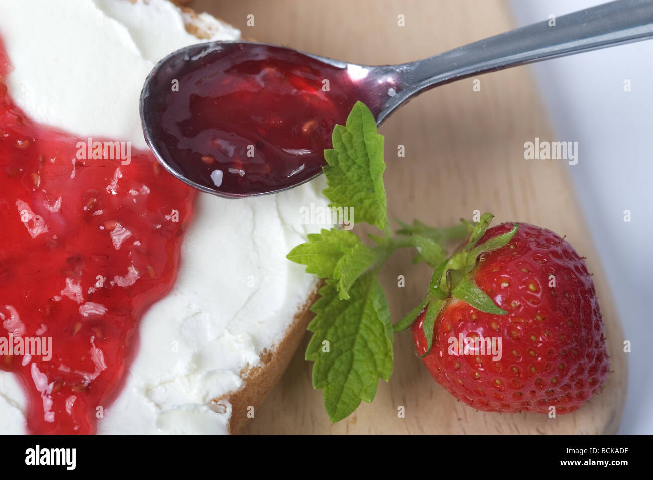 Toast with spoon Stock Photo - Alamy