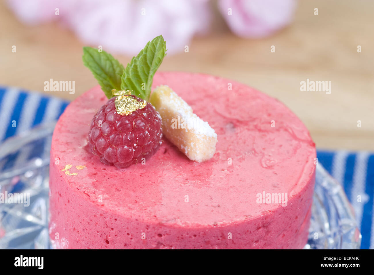 Raspberry with gold leaf Stock Photo - Alamy