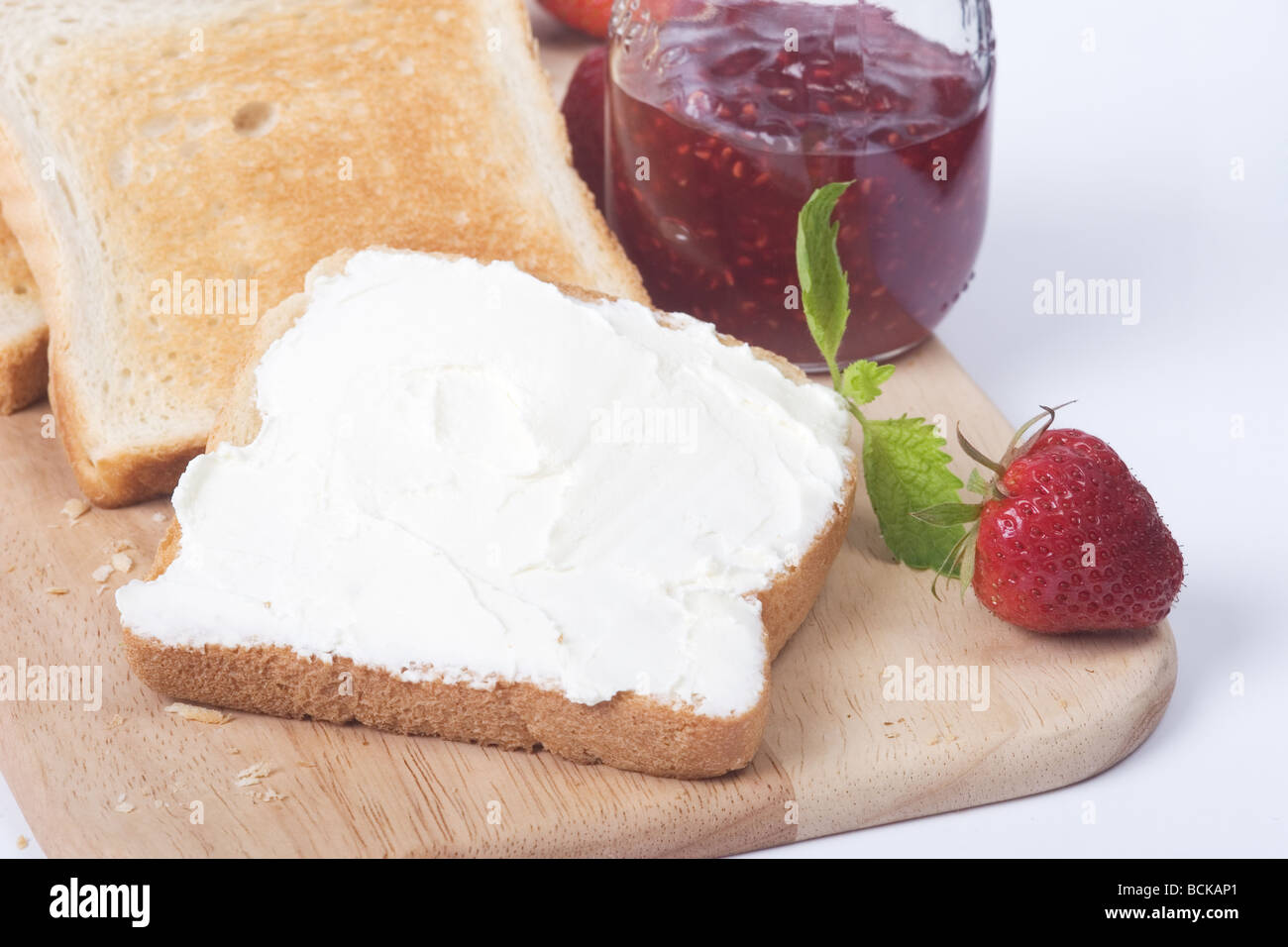 Toast with jam Stock Photo - Alamy