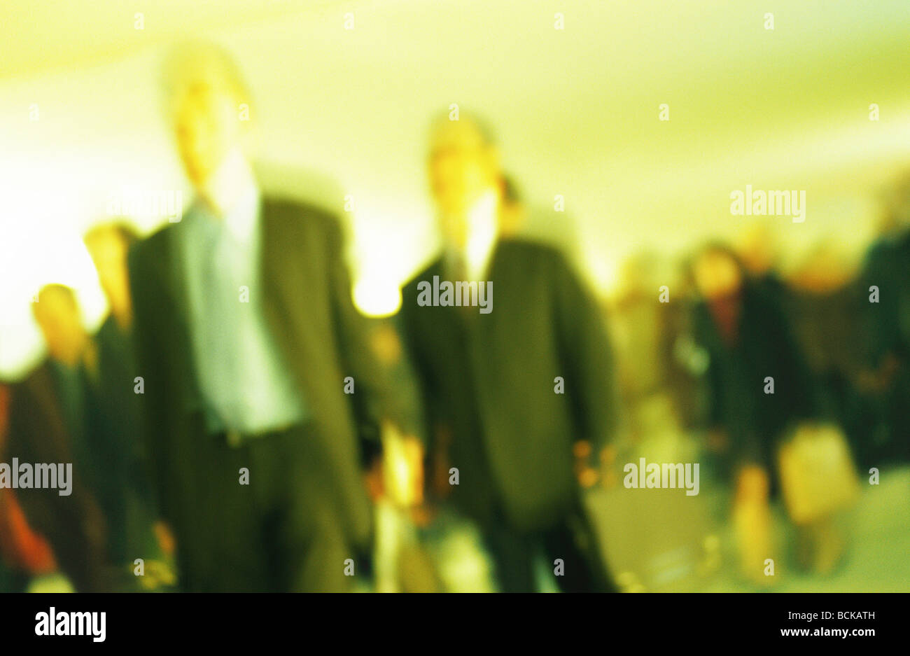 Businessman walking through concourse crowd hi-res stock photography ...
