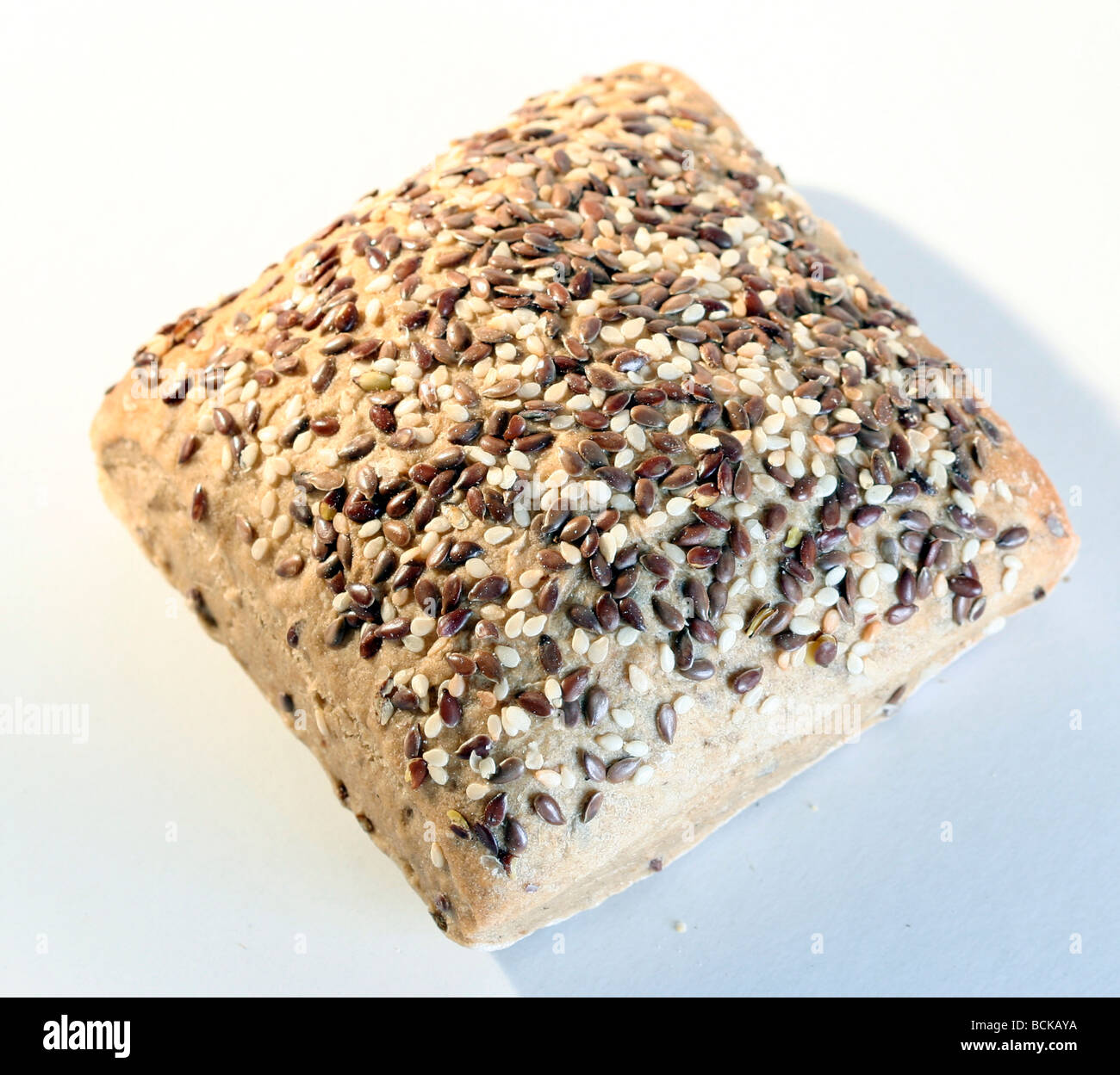 Baked bread with seeds isolated Stock Photo - Alamy