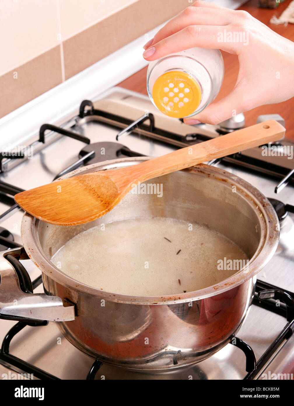 Cooking rice on the cooker Stock Photo - Alamy