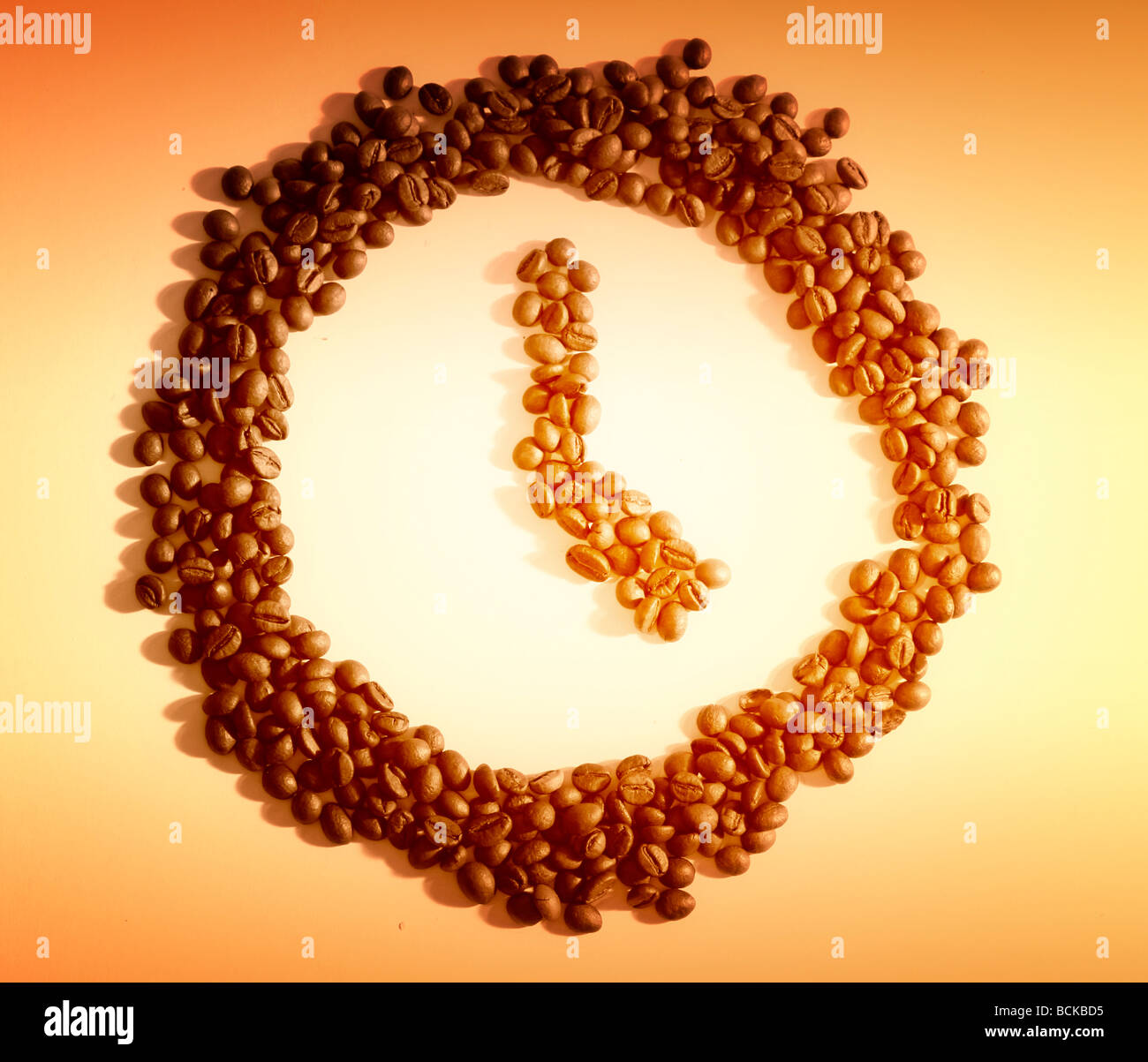 Clock made from coffee beans Stock Photo - Alamy