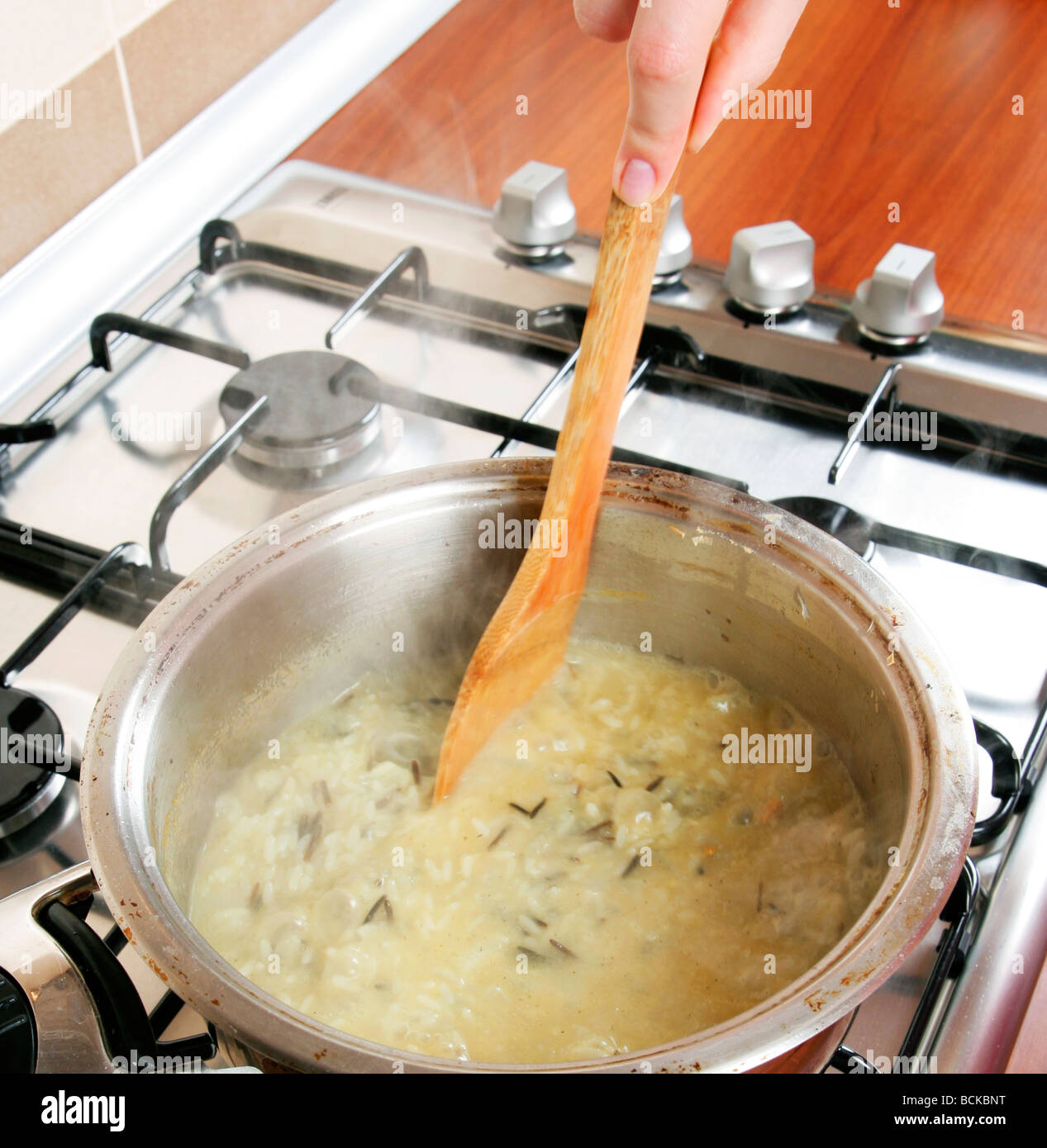 Cooking rice on the cooker Stock Photo - Alamy