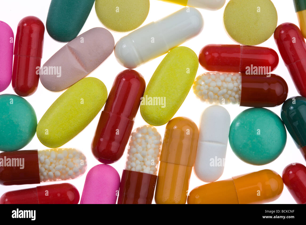 Colored tablets and medicines Stock Photo - Alamy