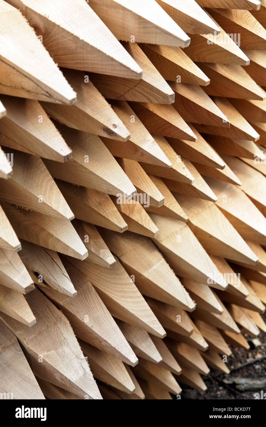 piled sharpened wood piles in close-up Stock Photo - Alamy