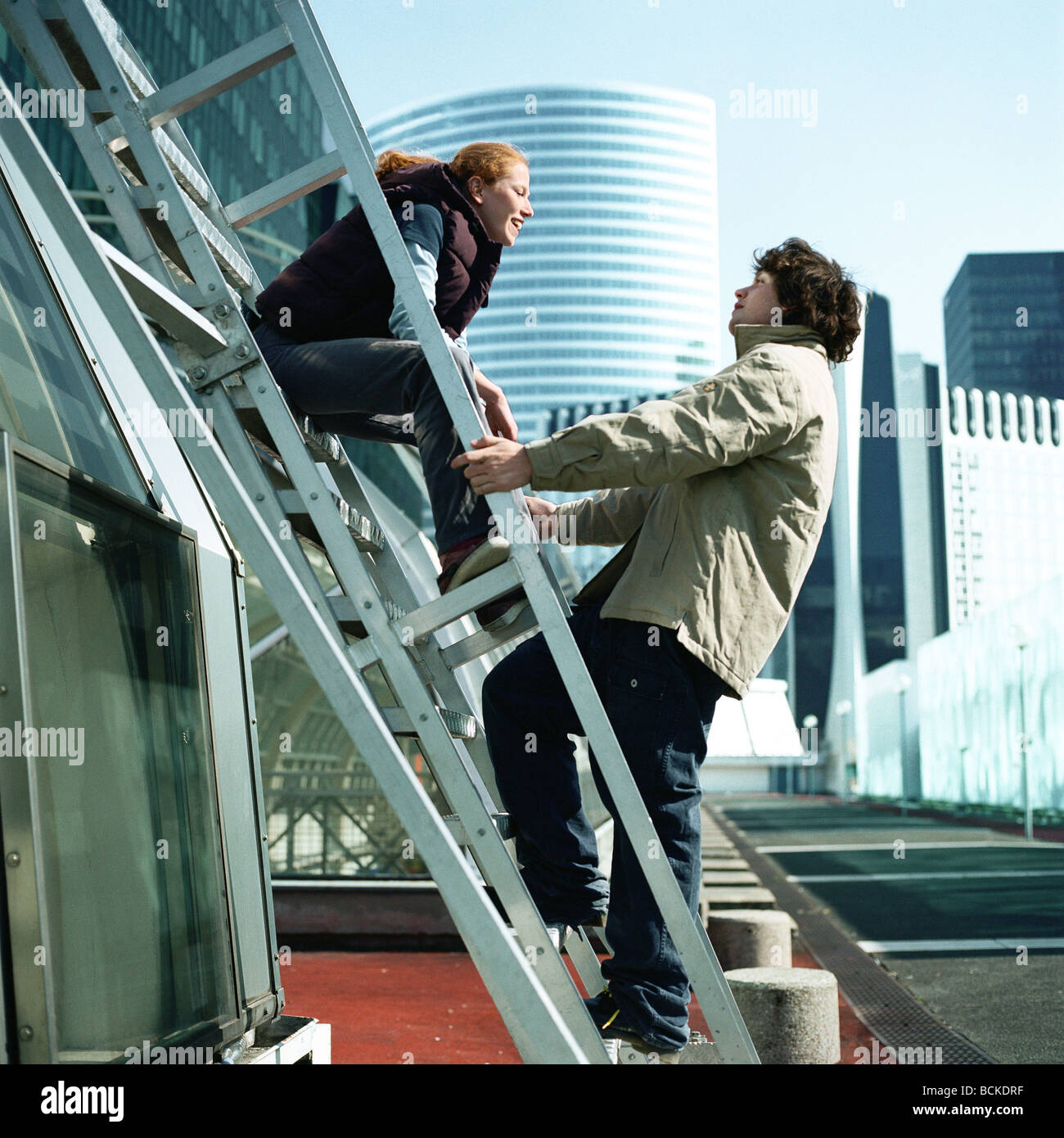 Woman Sitting On Ladder In Stock Photos & Woman Sitting On Ladder In ...