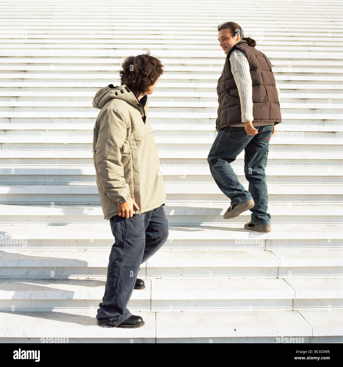 People walking on steps Stock Photo - Alamy