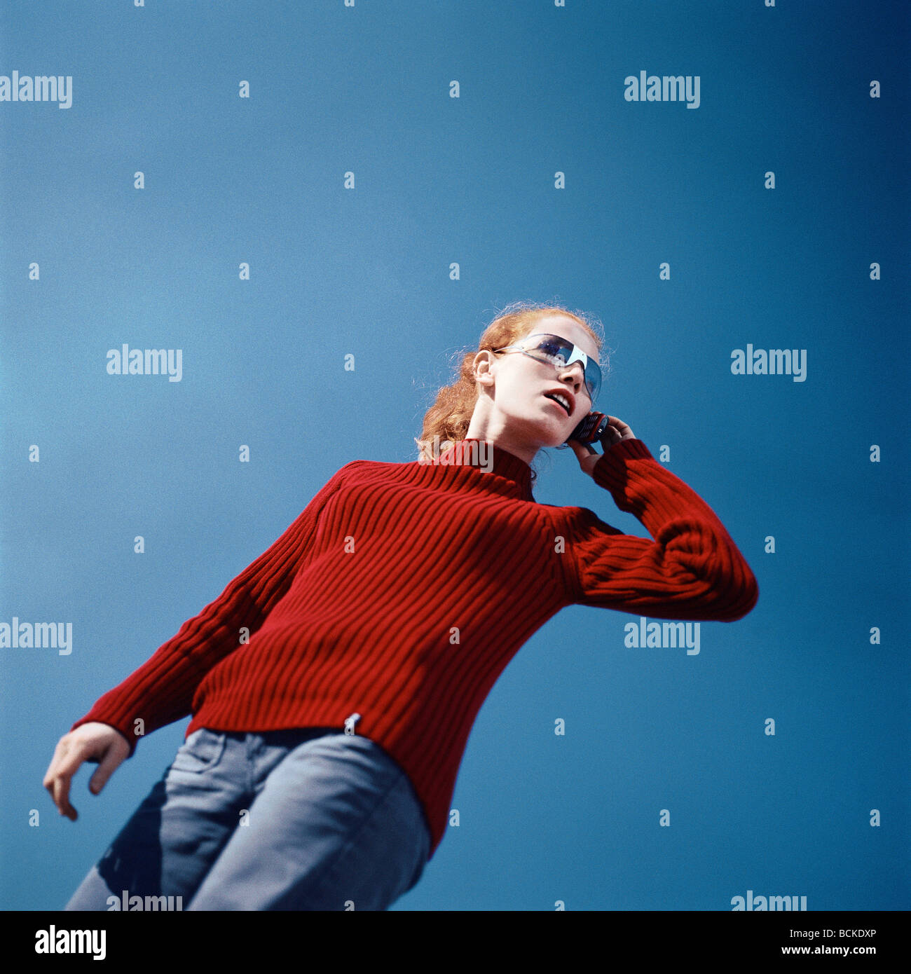 Young woman, low angle view Stock Photo - Alamy