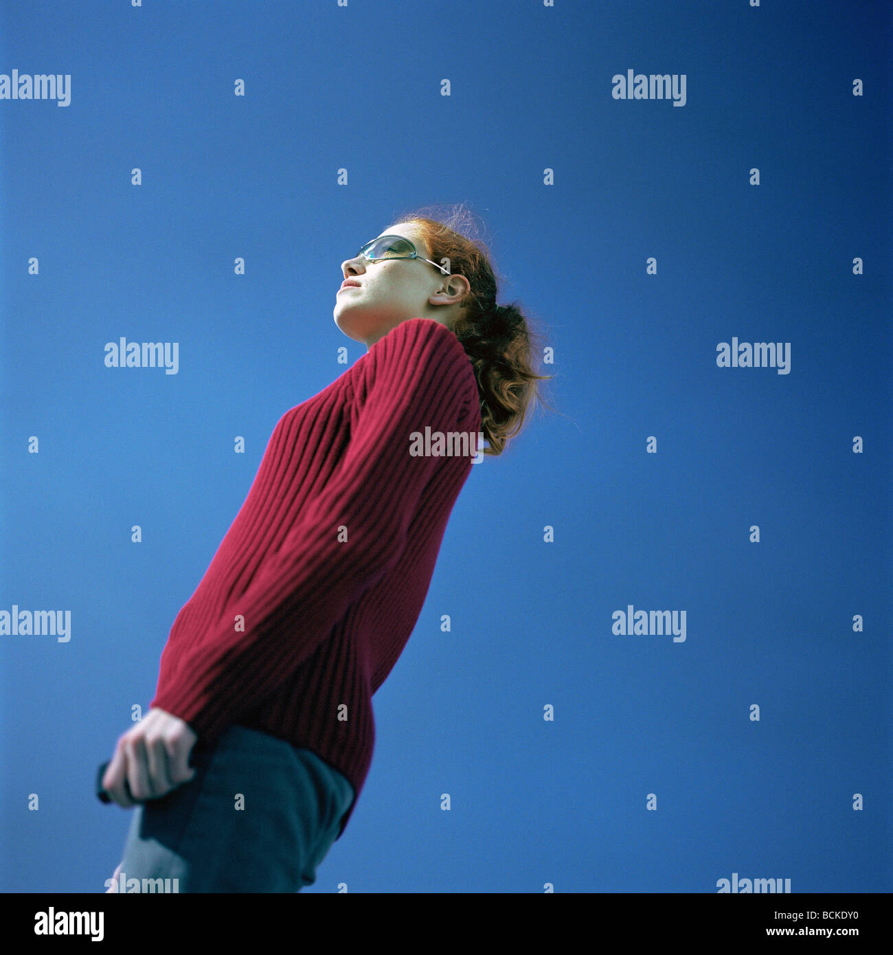 Young woman, low angle view Stock Photo - Alamy