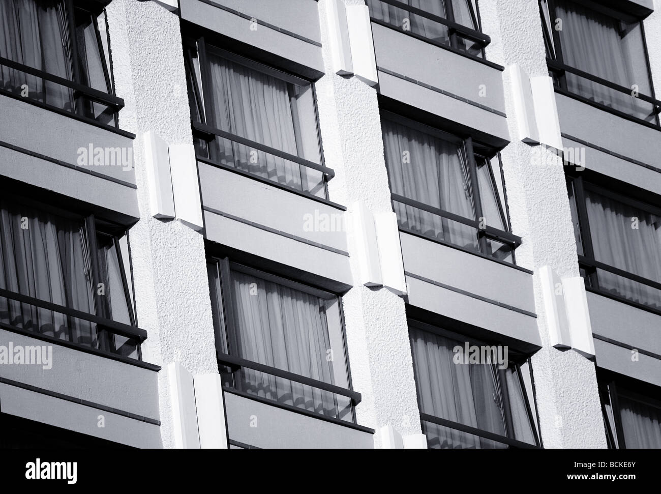 Close-up picture of an hotel: room windows Stock Photo - Alamy