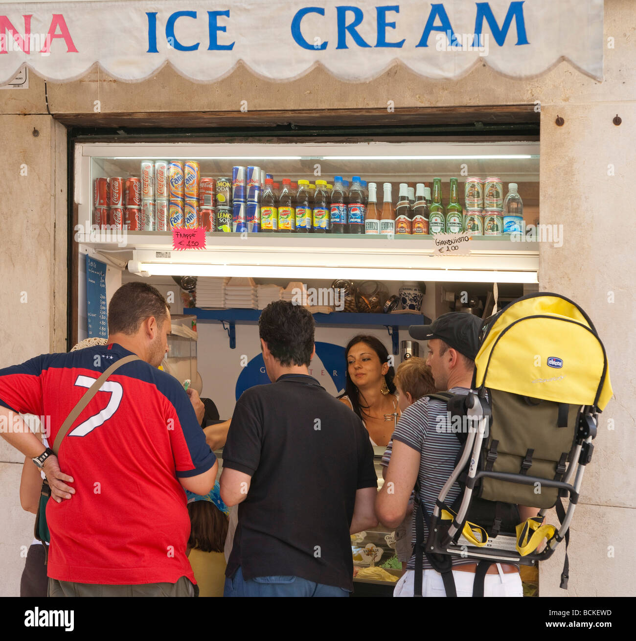 Venice - ice cream kiosk and customers one with baby backpack Stock ...