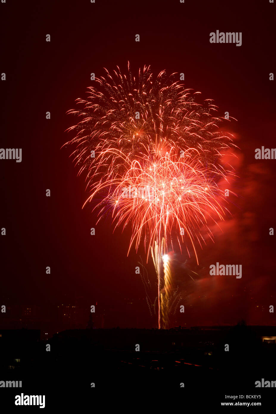 Fireworks rocket in the night sky Stock Photo - Alamy