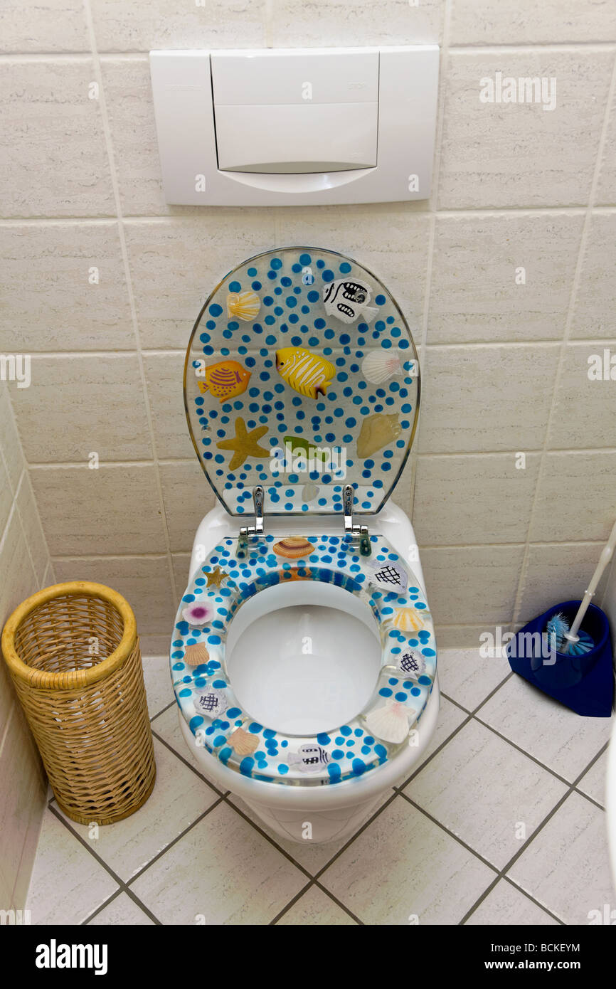 Toilet with an open toilet seat Stock Photo - Alamy