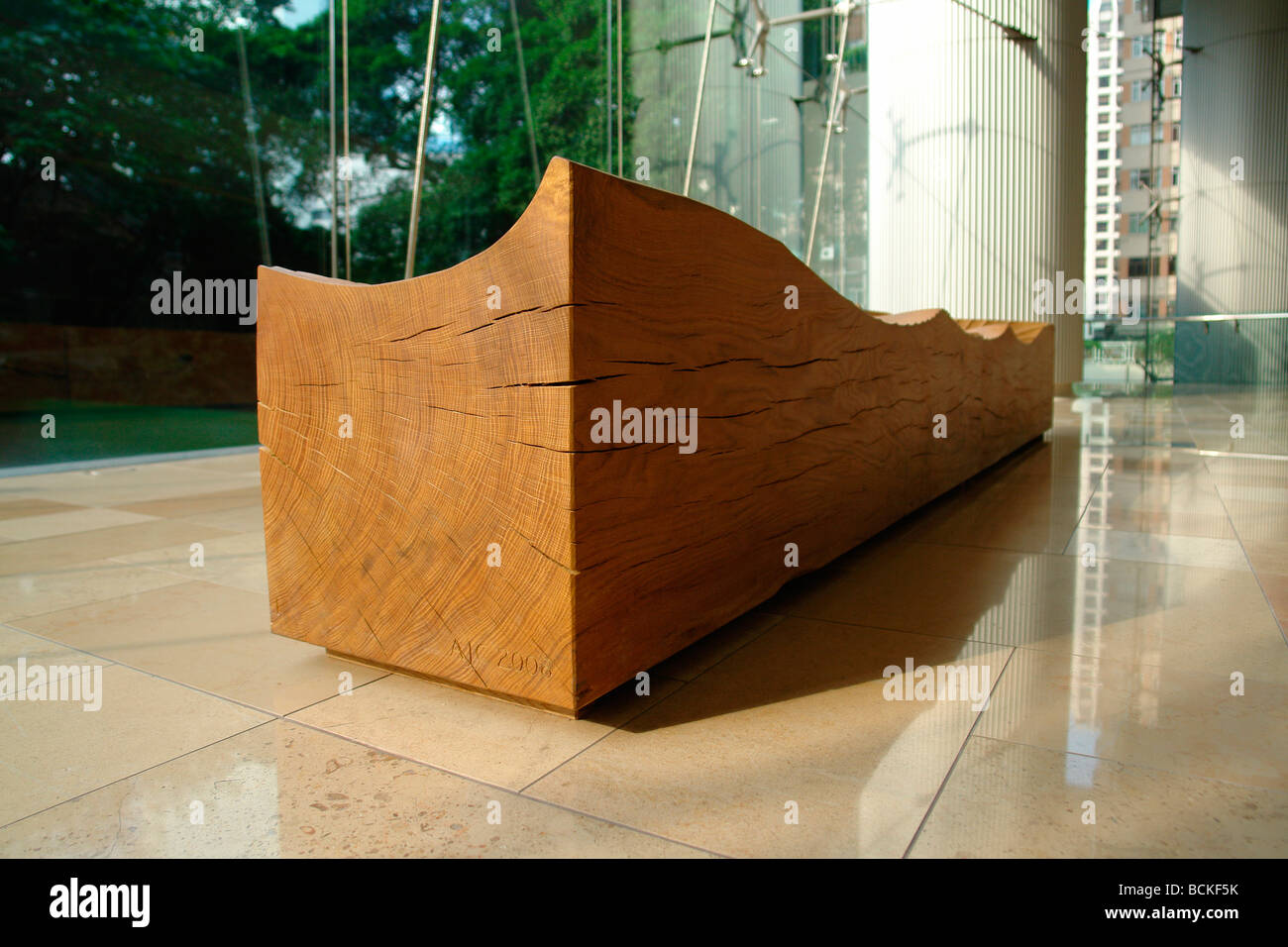 Designer wooden chair in one piece of wood Stock Photo - Alamy