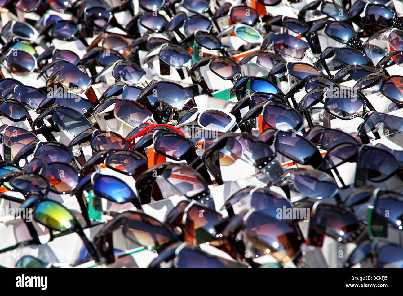 Colorful and varied selection of different sunglasses Stock Photo - Alamy