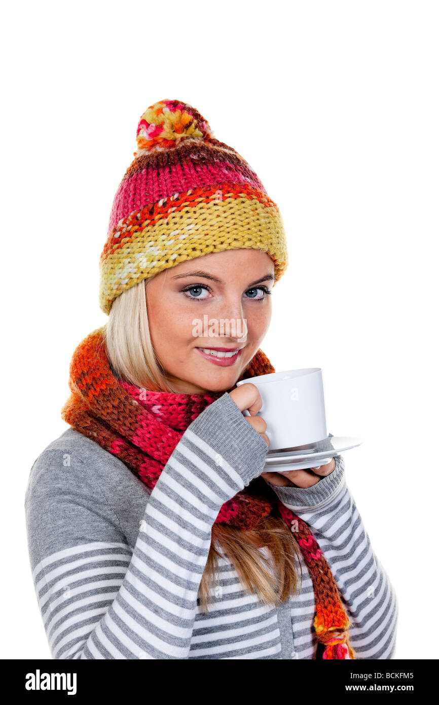 young woman with cap and hot tea Stock Photo - Alamy