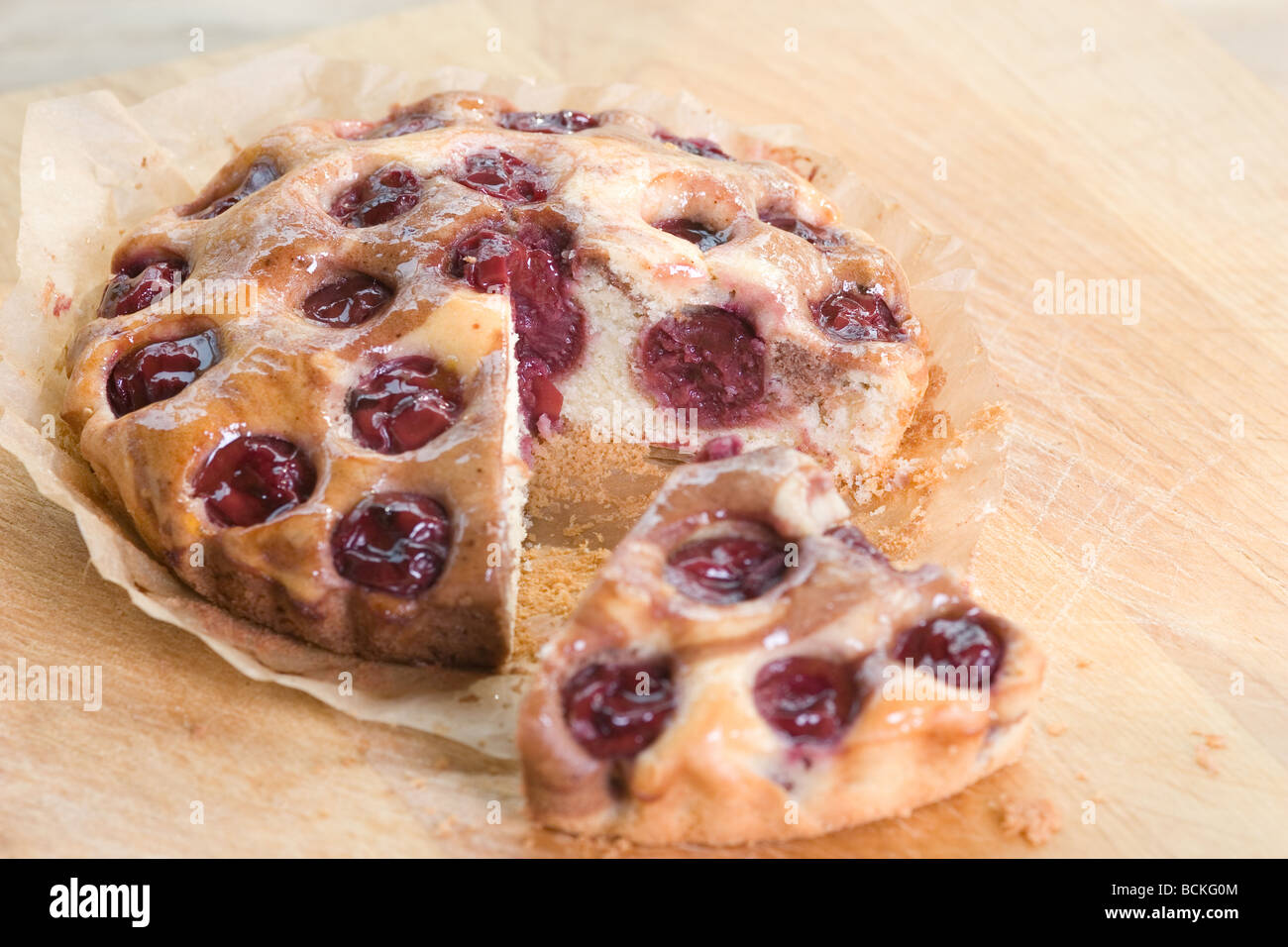 Cherry pie cut Stock Photo - Alamy
