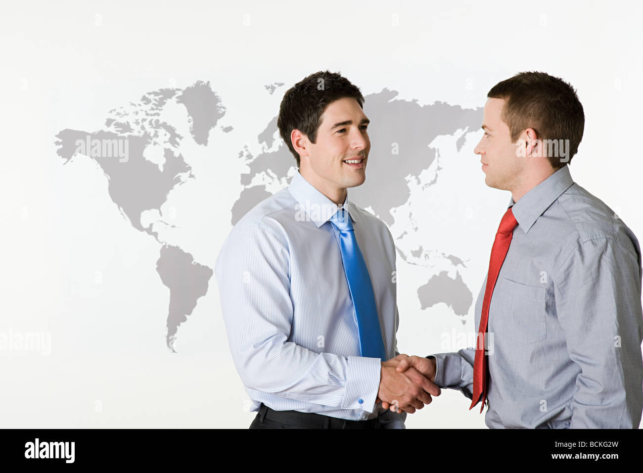 Businessmen shaking hands Stock Photo - Alamy