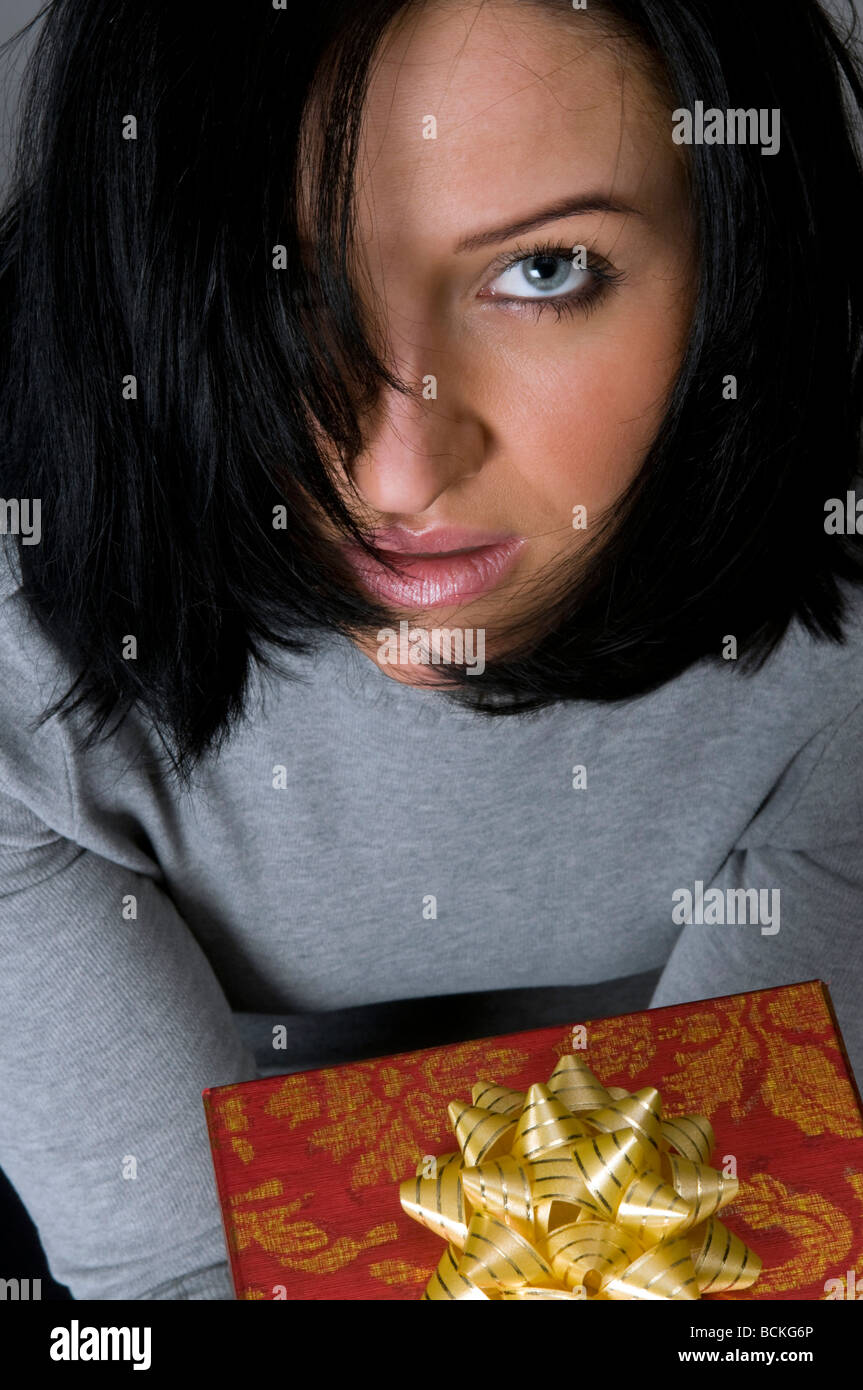 Woman with gift box Stock Photo - Alamy