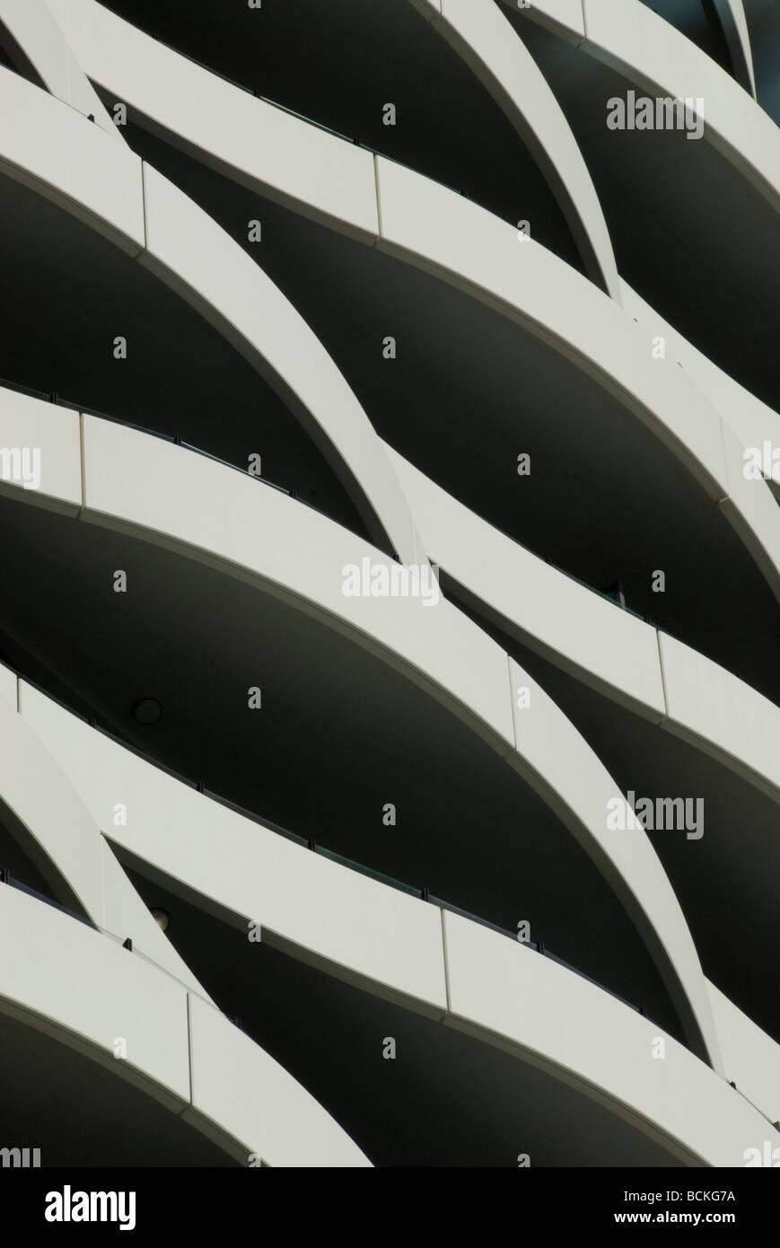 Curved balconies of apartments, tower block, high rise building ...