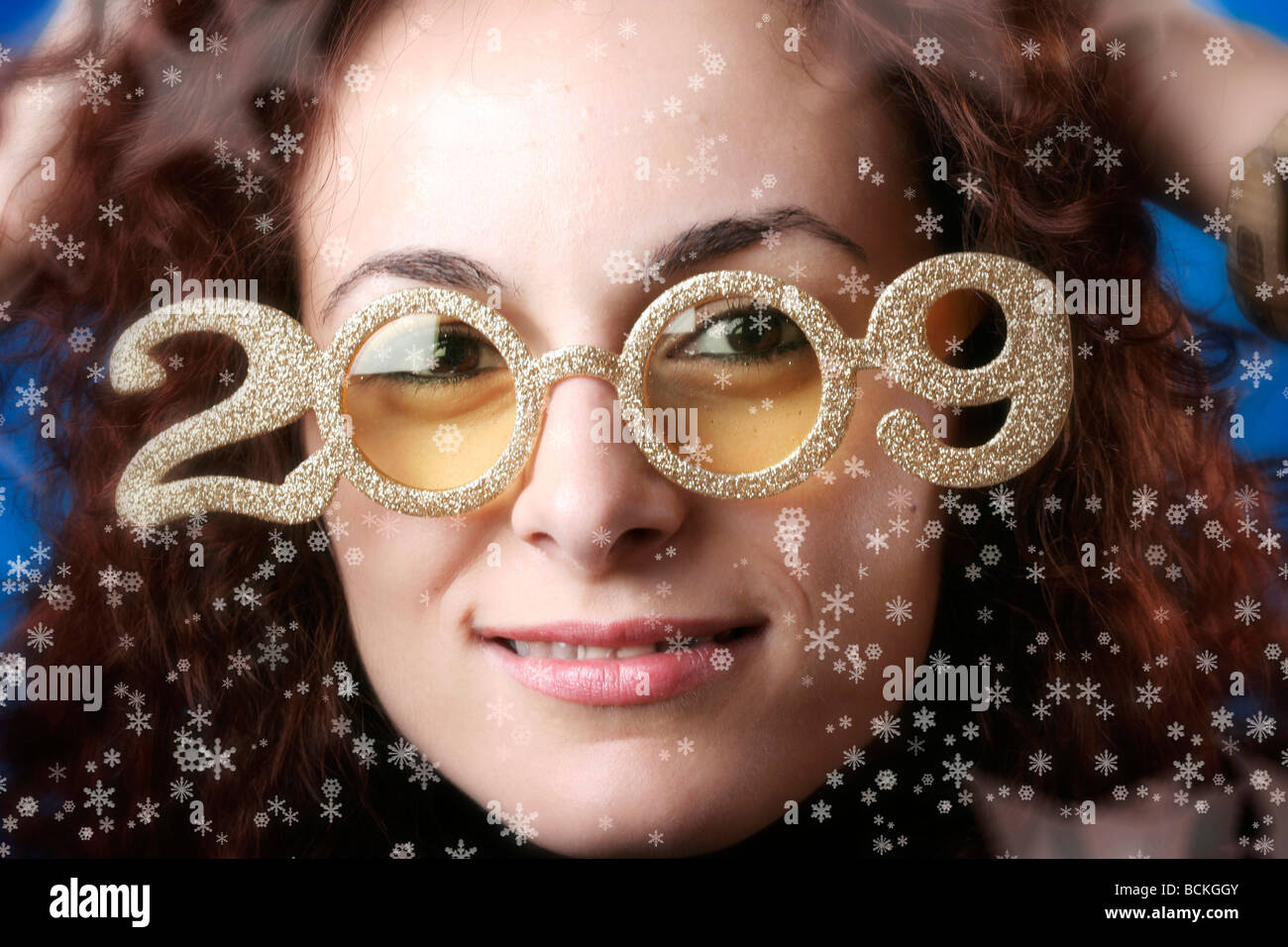 Beautiful woman celebrating the new year Stock Photo - Alamy