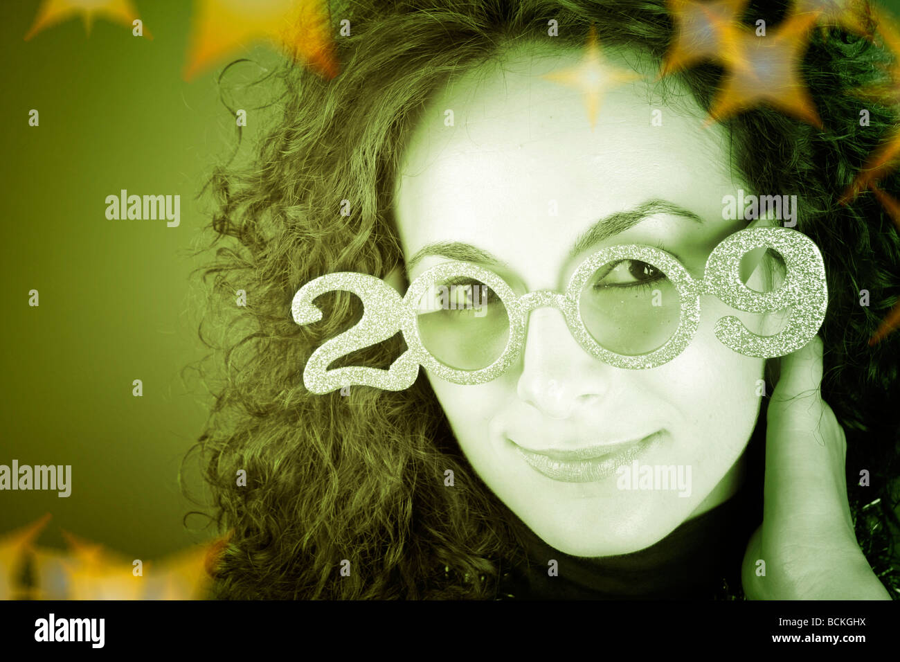 Beautiful woman celebrating the new year Stock Photo - Alamy