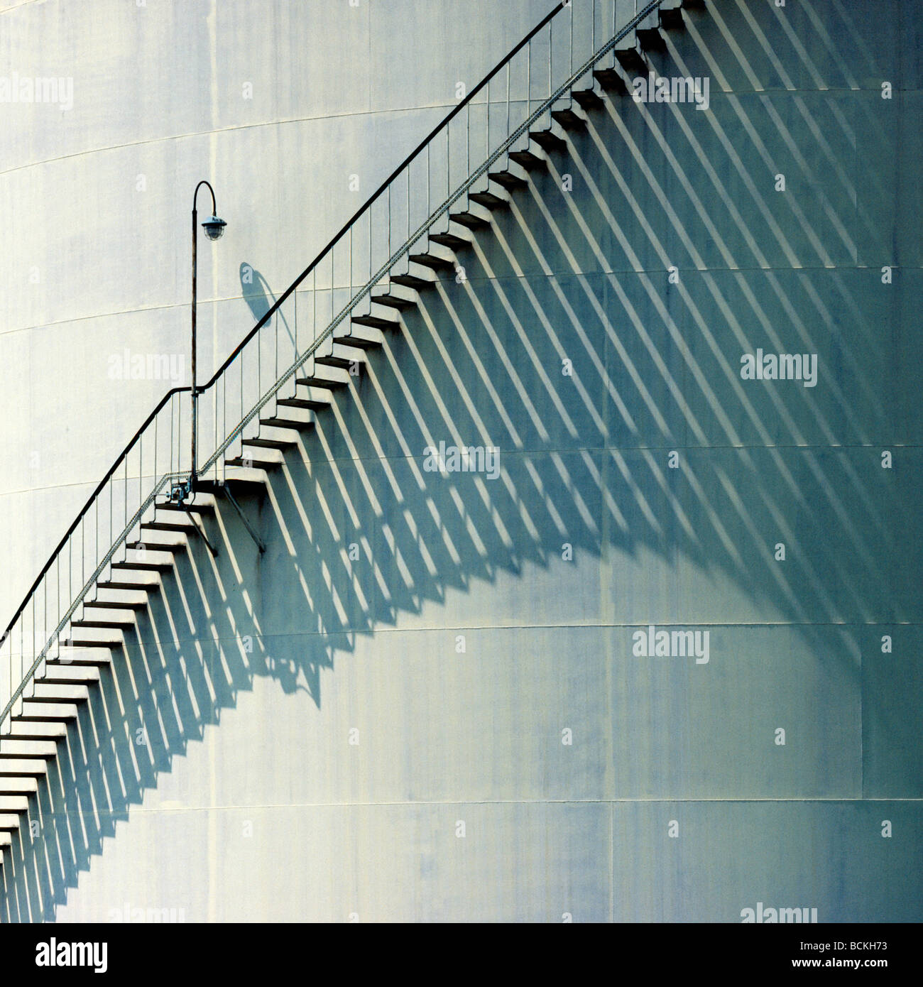 Stairs on side of wall with shadow Stock Photo - Alamy