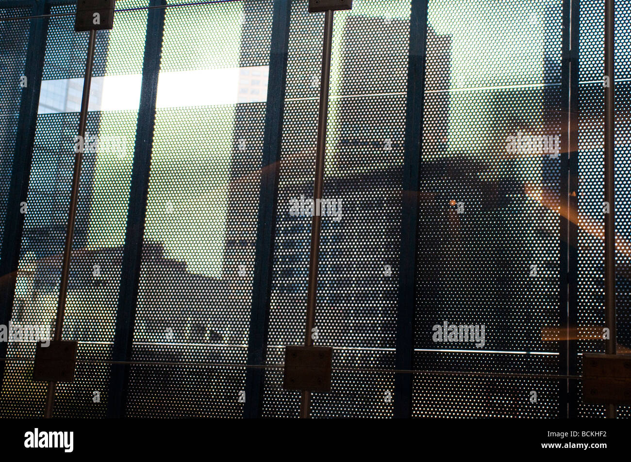 High rise blocks seen through mash screen Malbourne Australia Stock ...