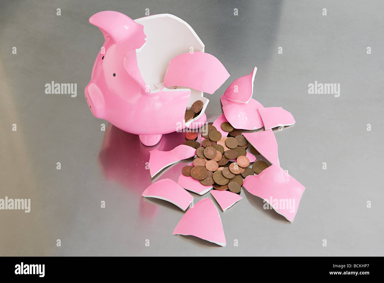 Broken piggy bank Stock Photo - Alamy