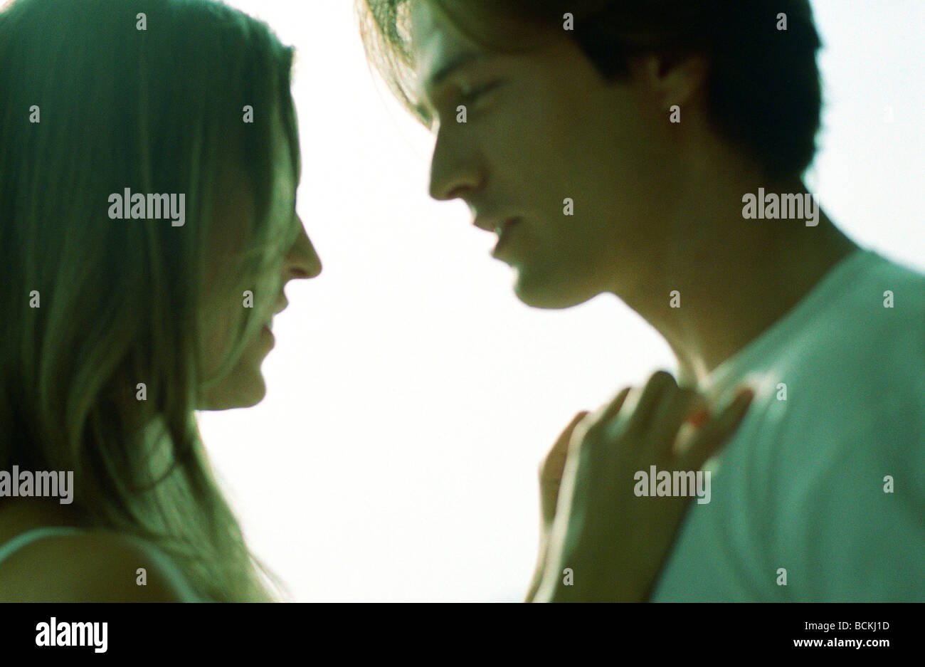 Man and woman face to face, head and shoulders Stock Photo - Alamy