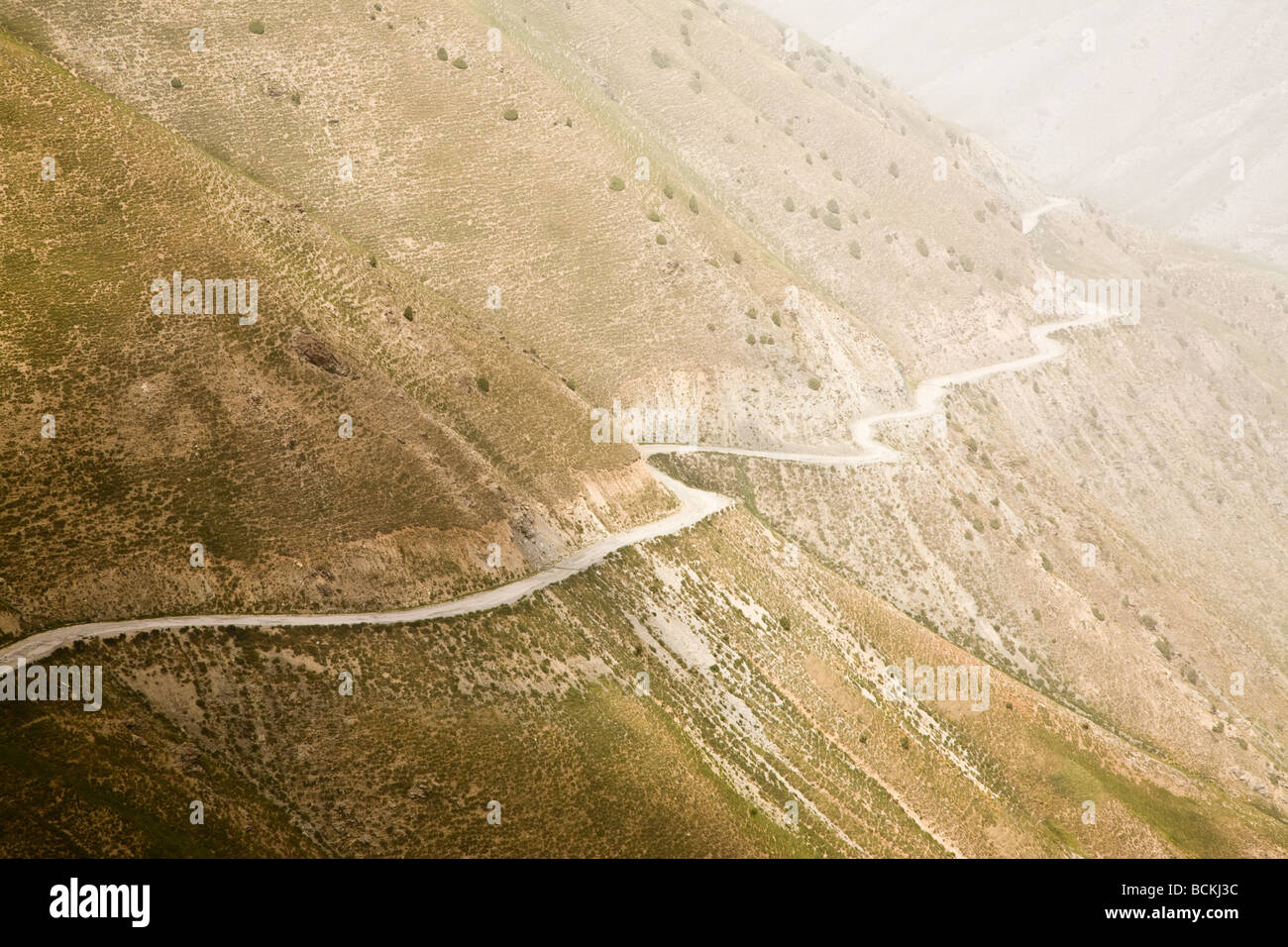 Road winding through mountains Stock Photo - Alamy