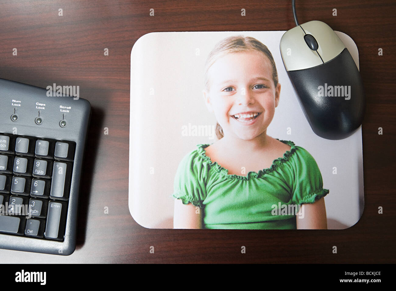 Personalised mousepad with photo of little girl on it Stock Photo - Alamy