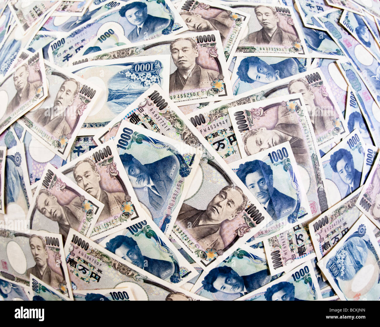 Many Japanese yen currency notes Stock Photo - Alamy