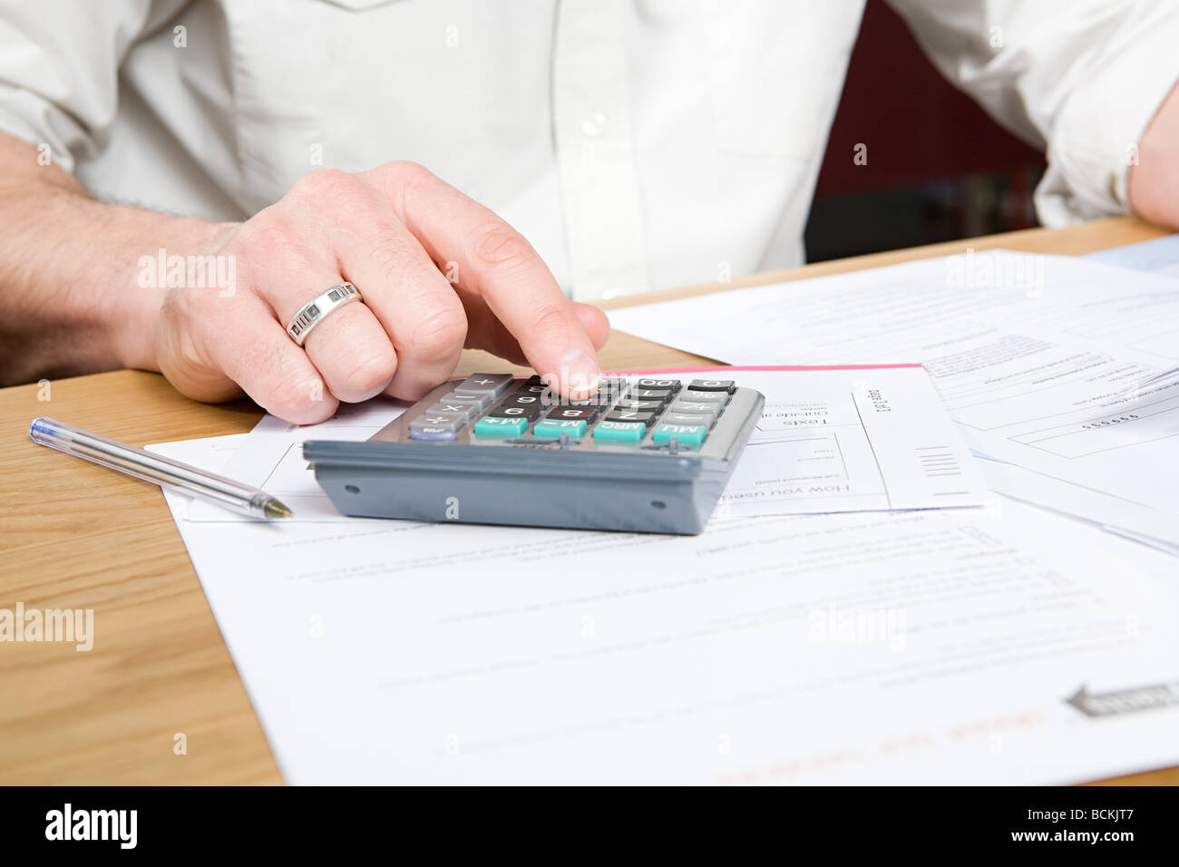 Person doing home finances Stock Photo - Alamy