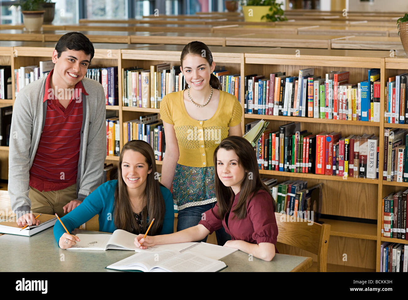 School students in library Stock Photo - Alamy