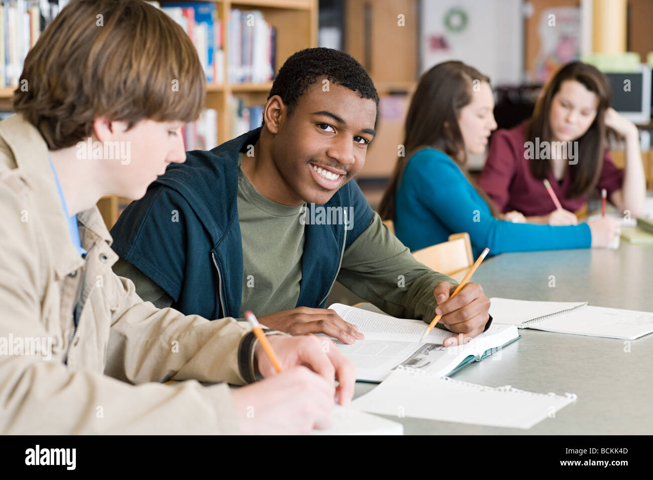 School students in library Stock Photo - Alamy