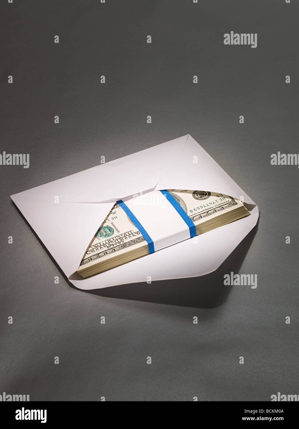 Hundred dollar bills in envelope Stock Photo - Alamy