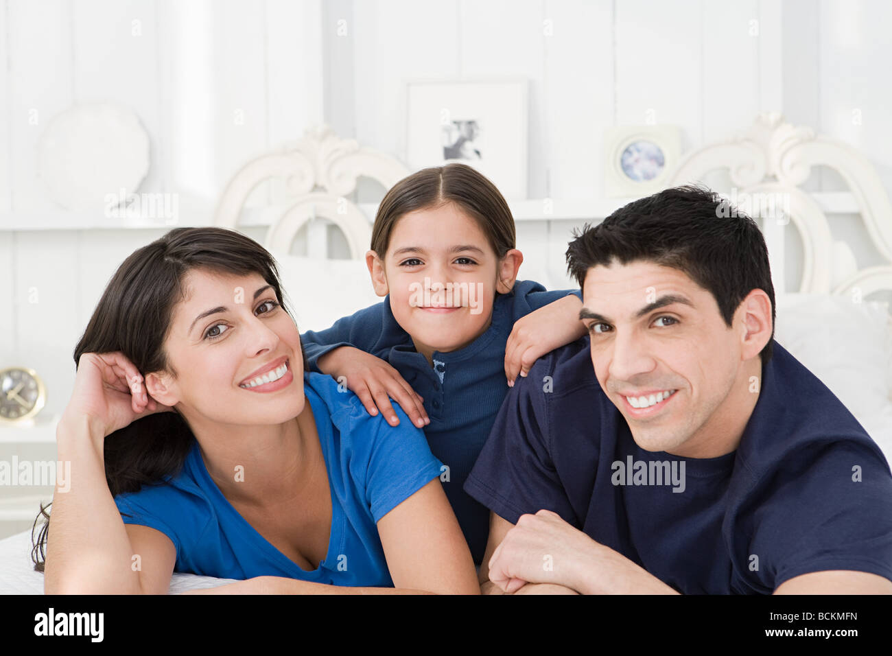 Hispanic parents with daughter Stock Photo - Alamy