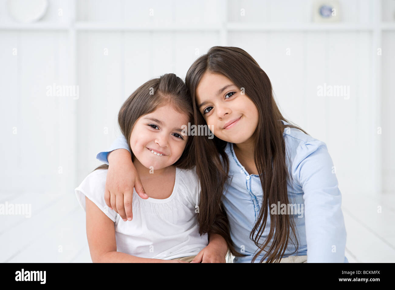 Portrait of hispanic sisters Stock Photo - Alamy